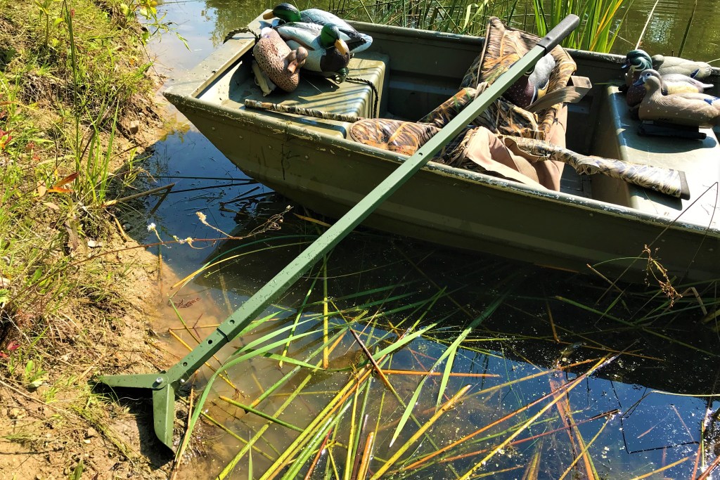 Duck foot push pole with telescopic handle - Meritt Products, LLC